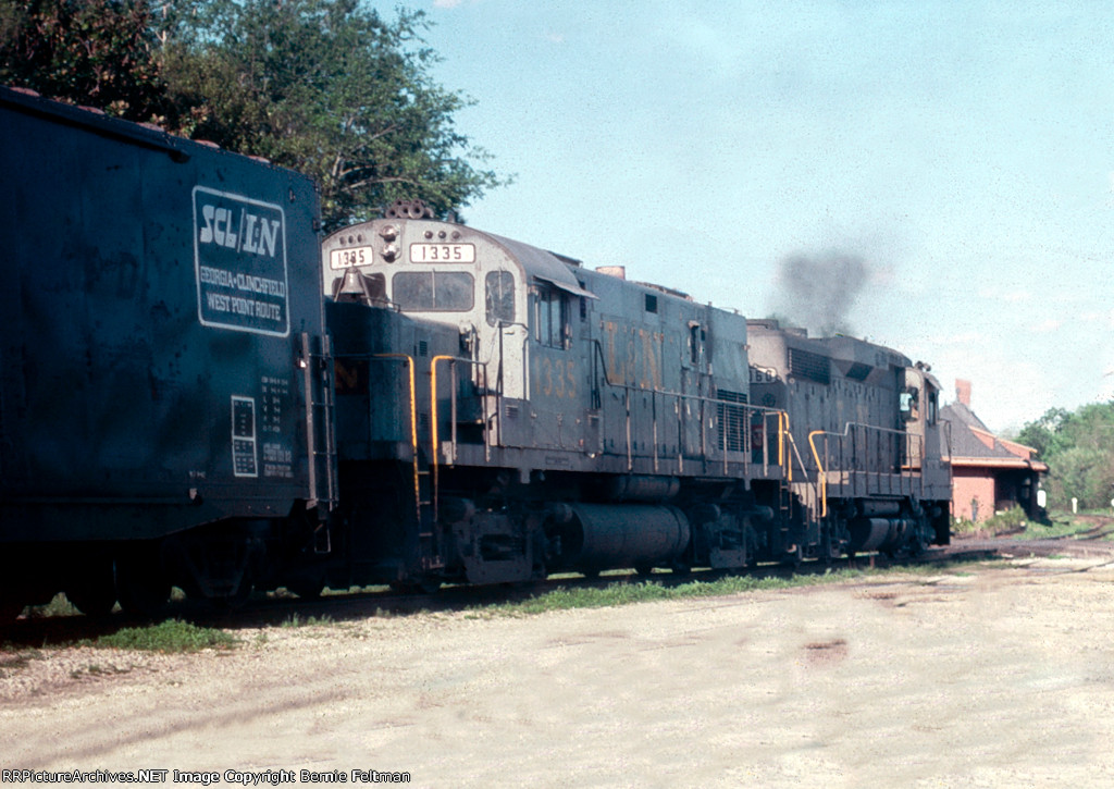 L&N Alco Century C420 #1335, with a nose mounted bell, is trailing L&N GP30 #1060 with Western ...